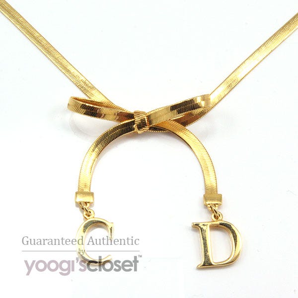 Christian Gold Ribbon Necklace | Yoogi's Closet